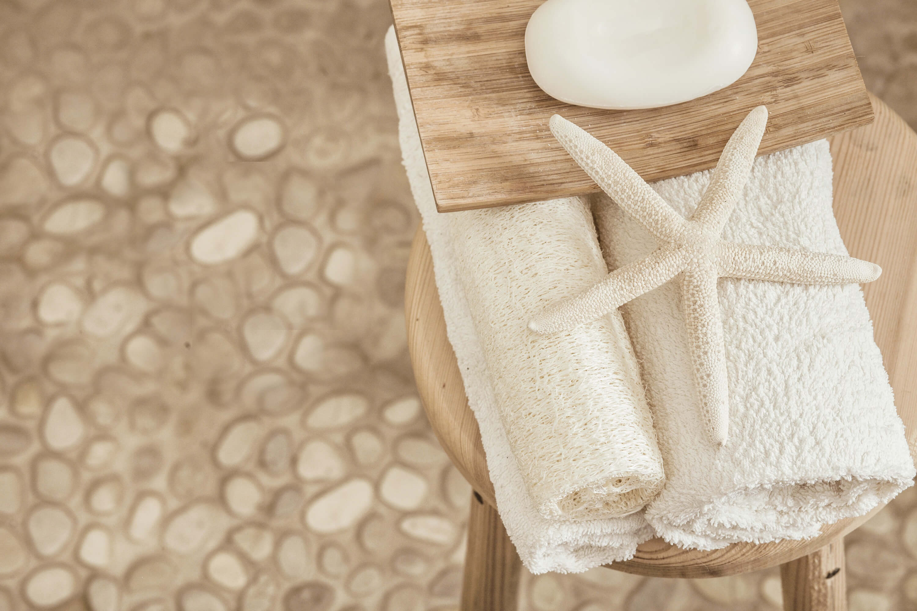 How to Achieve a River Rock Shower Floor with Pebble Tile | BuildDirect ...